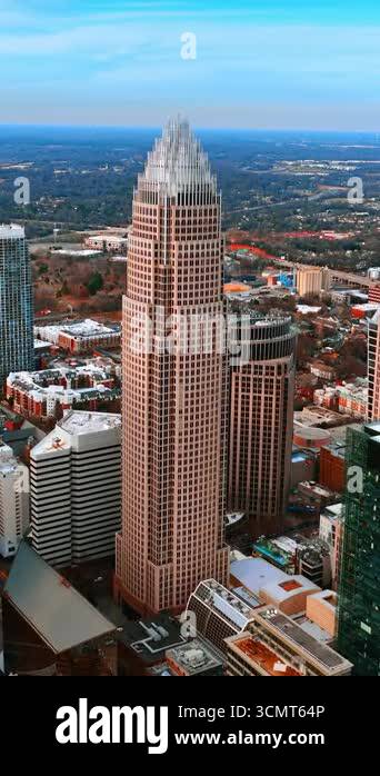 Flying closer to the high-rise building in the uptown of Charlotte ...