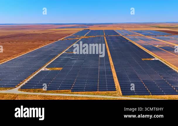 Solar fields produce renewables. Expansive solar panels stretch across ...
