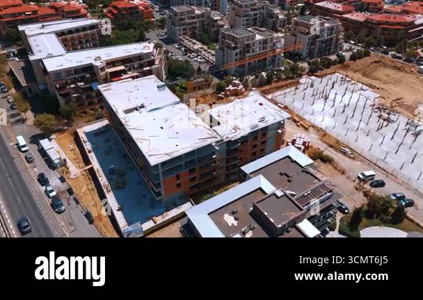 Urban residential building projects. Construction progresses on residential buildings in a ...