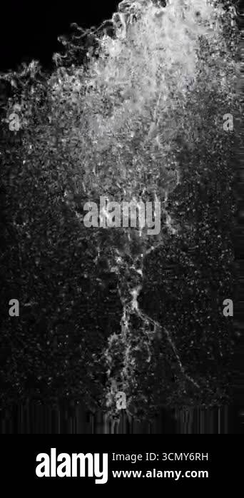 Super Slow Motion of Flying Water Splashes, Black Background. Filmed on ...
