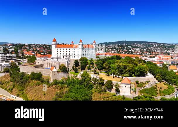 Bratislava Castle view with green hills and blue sky. The iconic ...