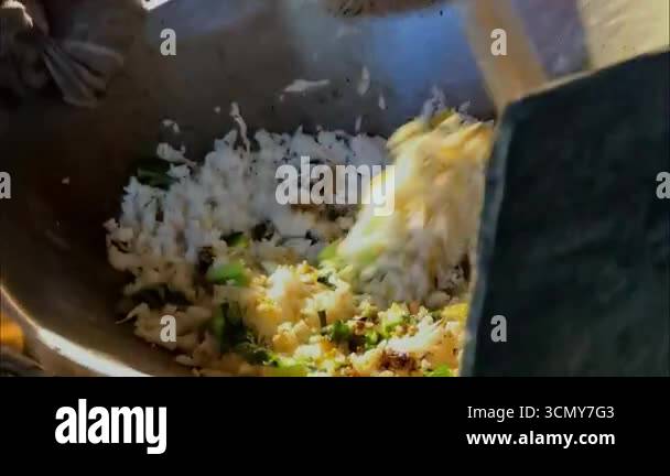 This video shows the creation of fried rice. Witness the preparation ...
