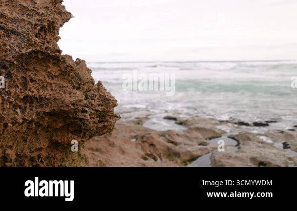 Erosion and weathering on a rocky coastline Stock Video Footage - Alamy