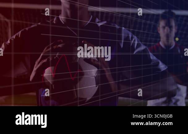 Time-based fade creating player holding soccer ball beside teammate ...