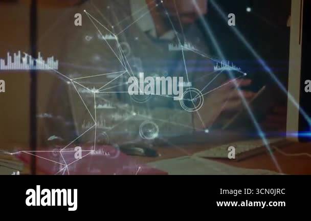 Office worker picking smartphone on message alert and typing analytics with network charts ...