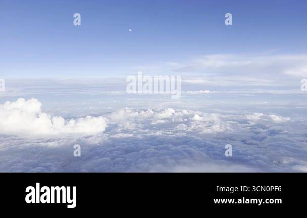 Point of view aerial moon above the clouds airplane passenger Stock ...