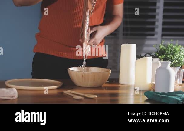 woman cooking in the kitchen, preparing for dinner Stock Video Footage ...