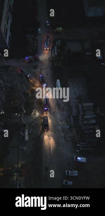 Police and firefighters teamwork at night. Night life in a criminal ...