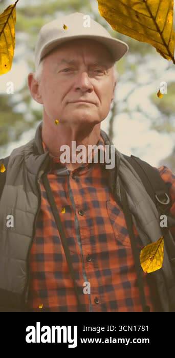 Animation of falling leaves over caucasian senior man walking ...