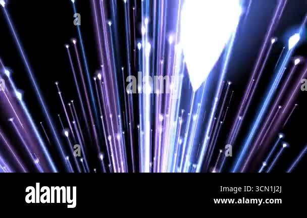 A vibrant display of light beams radiating in various colors against a ...