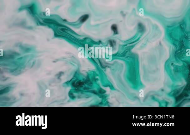 Shimmer paint. Ripple texture. Defocused green color water glitter ...
