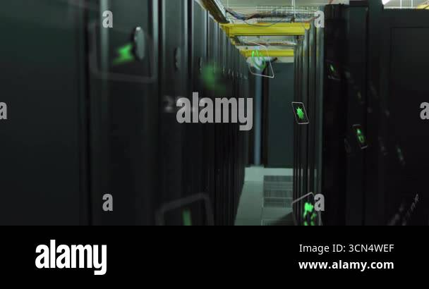 Camera pushing forward down server aisle green icons materializing drifting fading showing ...