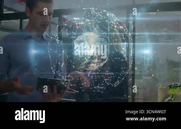 Man swiping tablet screen causing digital globe rotating while woman tapping data in tech office ...