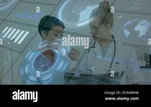 nurse gesturing at medical holograms animating for patient review while ...