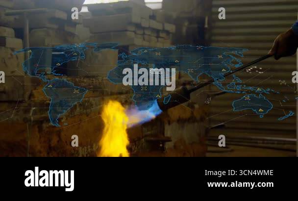Metalworker shifting torch over blocks updating holographic map ...
