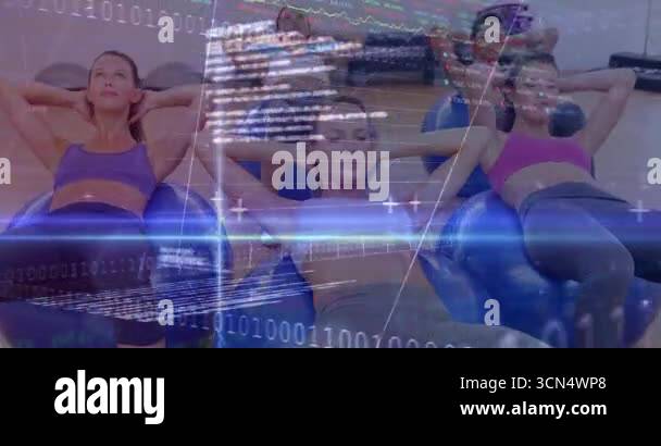 Women placing hands behind head doing crunches on exercise balls while ...