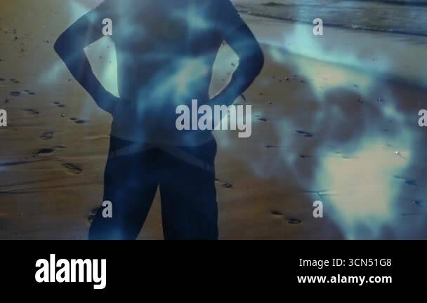 Senior man showing health beach routine, drawing energy aura from ...