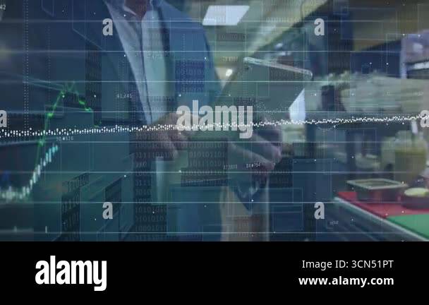 Kitchen manager shifting tablet charts monitoring performance while ...