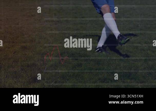 Swinging foot starting kick sending soccer ball right as charts rising ...