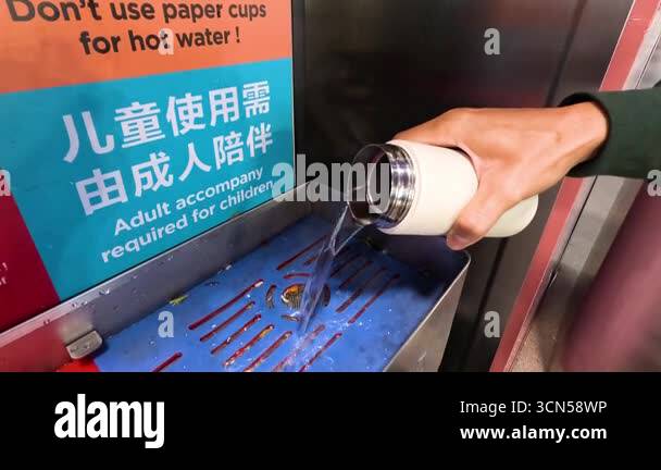 Person pours hot water despite clear warning sign Stock Video Footage ...