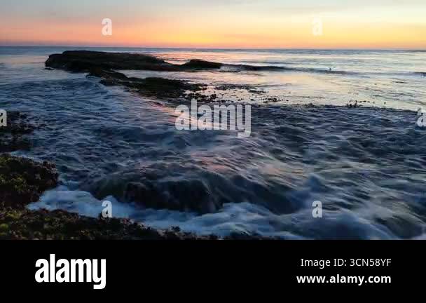 Low tide sunset Southern California coastal scenes with ancient reefs ...