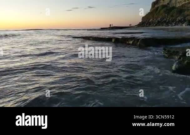 Southern California beach scenes 4K video at sunset with tide pools ...