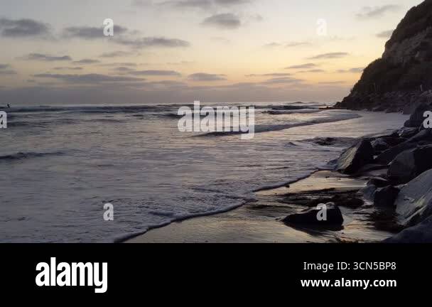 Southern California beach scenes at sunset with tide pools, silhouettes ...