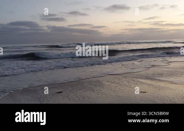 Southern California beach scenes at sunset with tide pools, silhouettes ...