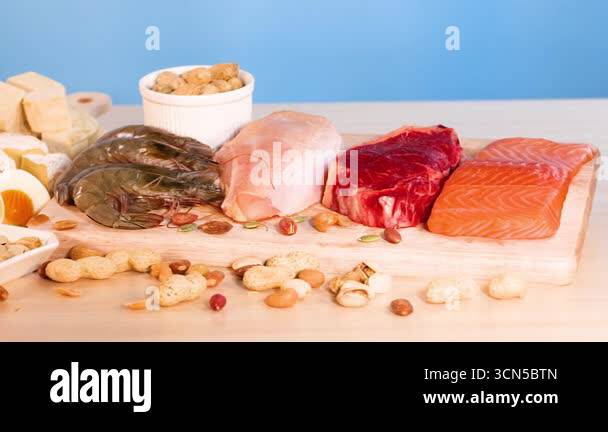 Variety of protein-rich foods on a table Stock Video Footage - Alamy