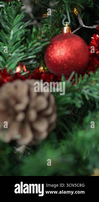 Vertical slow motion of Merry christmas and happy holidays, hand of an ...