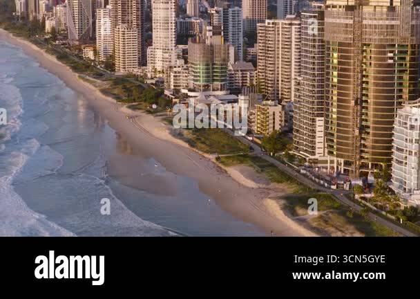 Aerial view of Gold Coast's iconic beachfront at sunrise, showcasing ...