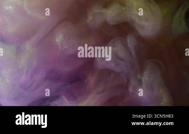 Haze spread. Shimmering flow. Purple yellow paint fog wave spray on ...