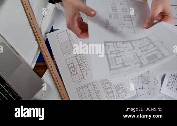 A detailed view of the architectural design process with tools and ...