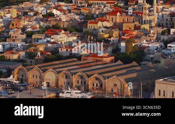 Aerial view of Chania town in Crete, Greece, highlighting a domed church, white buildings ...