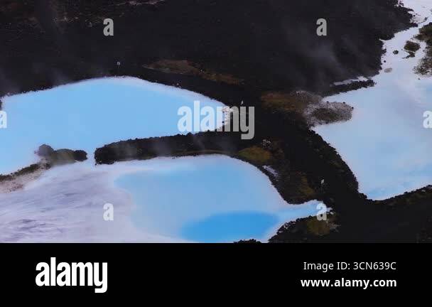 Aerial view of the Blue Lagoon Spa in Iceland, with bright blue ...