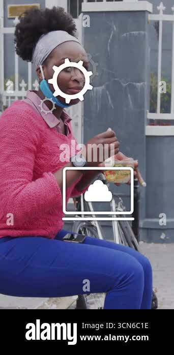 Sitting outdoors, woman surrounded by technology icons and animation ...