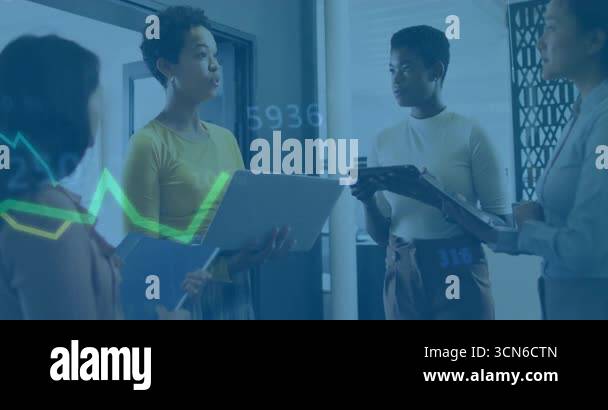 Speaker tapping laptop launching animated line chart at business meeting guiding team through ...