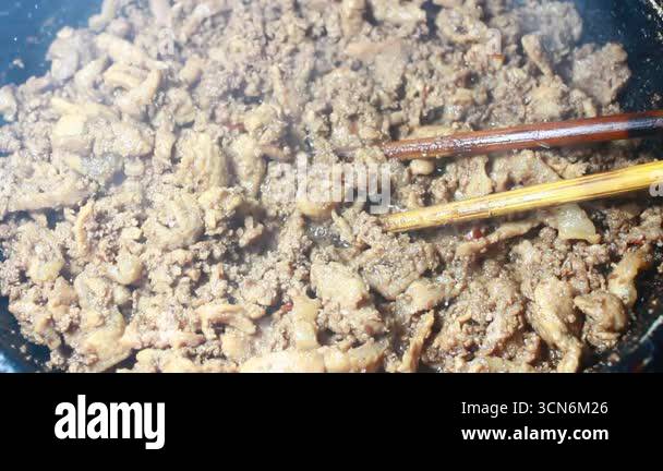 minced meat fried with shrimp paste Stock Video Footage - Alamy