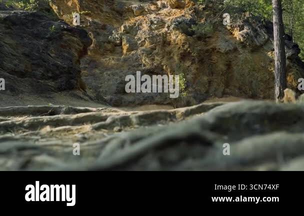 Sulfurous rock formations formed in the area of a volcano where sulfur ...