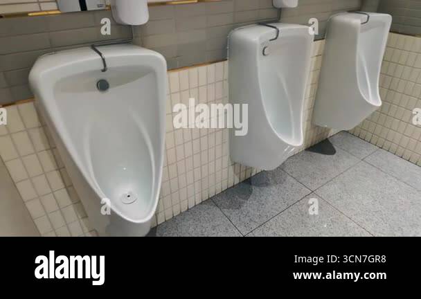 modern urinals in sleek bathroom, contemporary design and hygiene ...