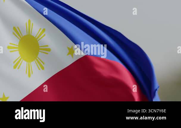 Close up view of the Philippine national flag gently waving with its ...