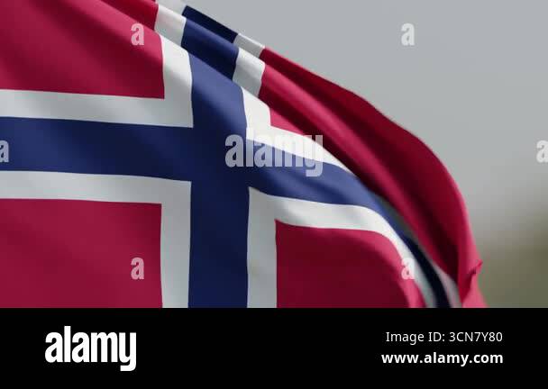 Dynamic close up of the Norwegian flag with its distinct red, white ...