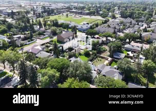 Scenic 4K drone video capturing homes, parks, and streets in the ...