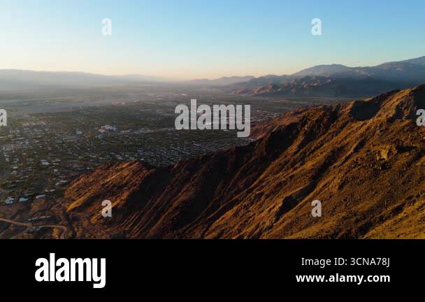 Aerial view of a desert cityscape with residential neighborhoods ...