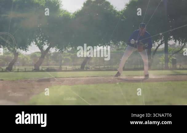 Baseball infielder scooping ground ball, creating dust, pivoting and ...
