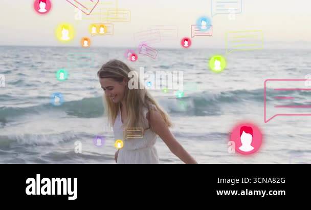 Walking barefoot leaving surf, woman smiling, social media icons swirling around her for ...