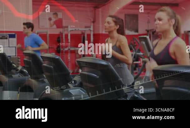 Gym friends starting treadmills and jogging while tracking performance ...