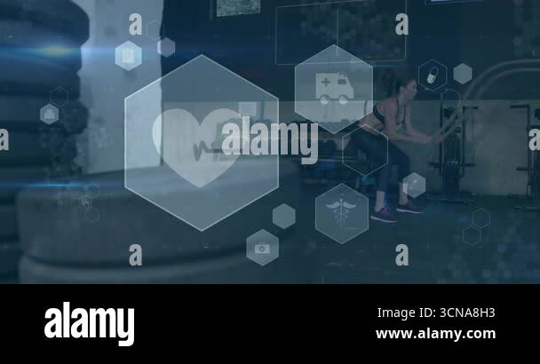 Camera showing health icons initiating woman squatting and waving battle ropes tracking health ...