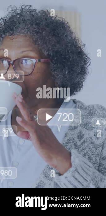 Using smartphone, elderly woman receiving social media notifications ...