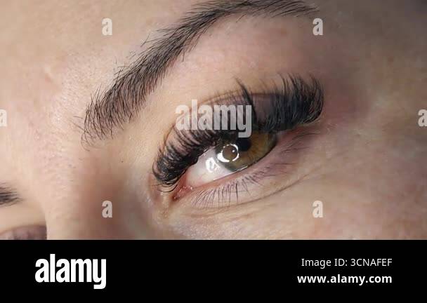 Close up of female eye with eyelash extensions ,eyelash extension ...